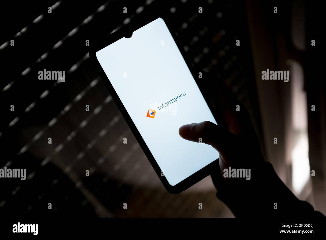 In this photo illustration an Informatica logo seen displayed on a ...