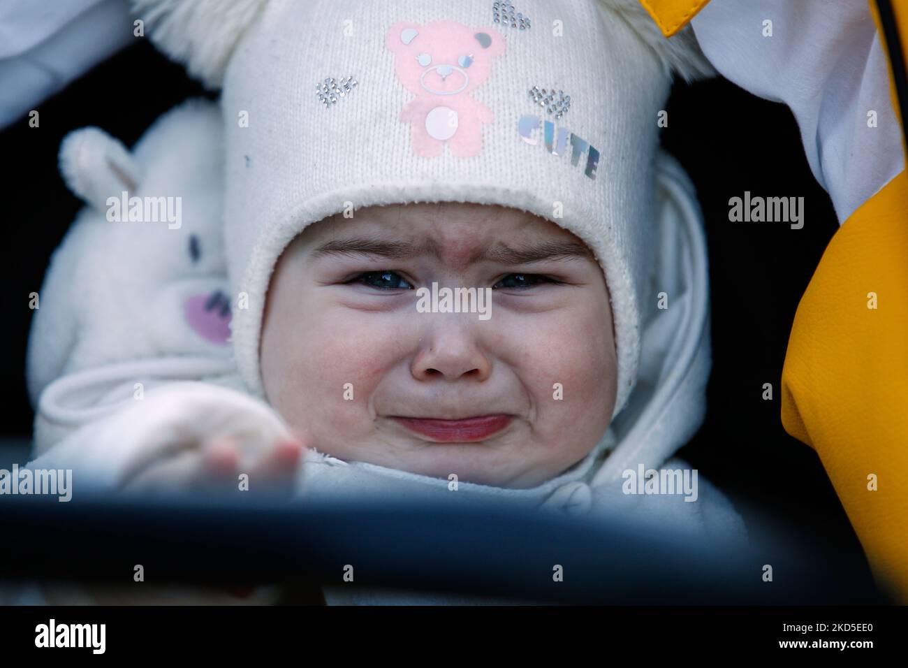 A baby is reacts to being photographed in Warsaw, Poland on 19 March ...