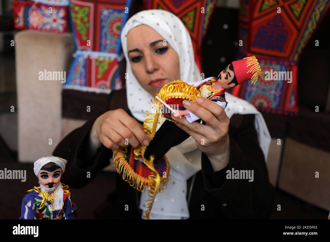 Palestinian woman Hanan al-Madhoun, 37, makes egyptian decorations and ...