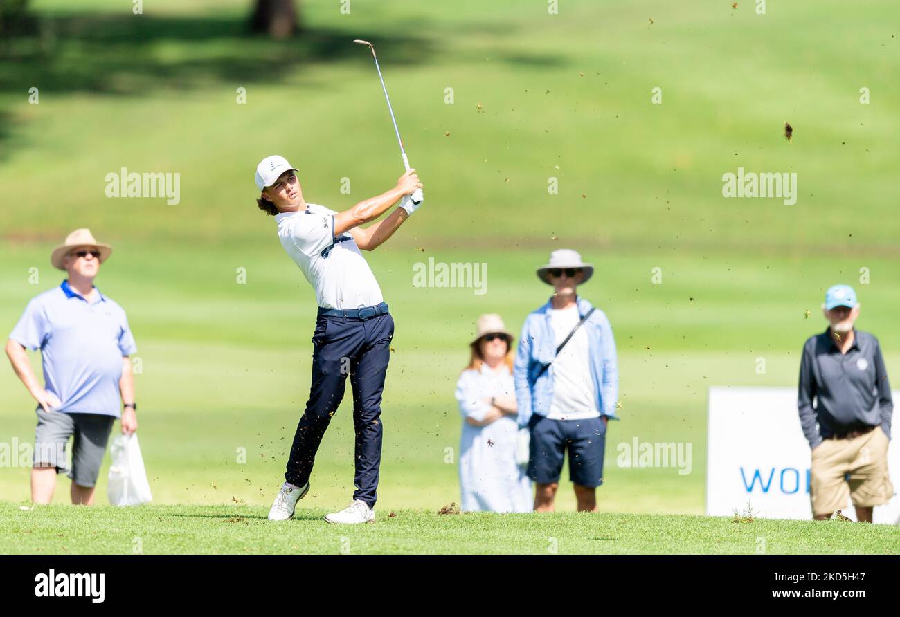 Harrison Crowe (A) of Australia plays his 2nd shot on the 1st hole ...