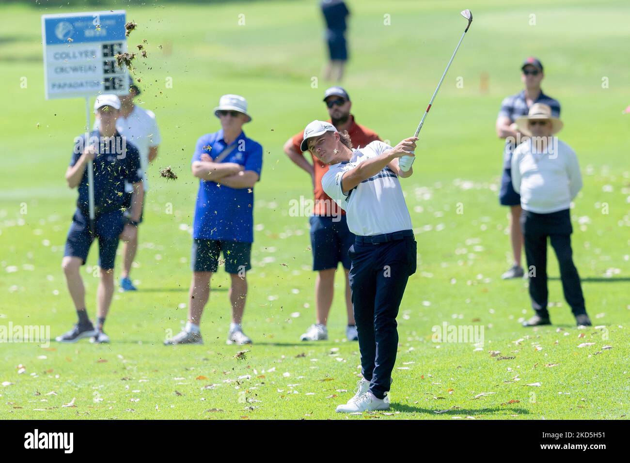 Harrison Crowe (A) of Australia plays his 2nd shot on the 2nd hole ...