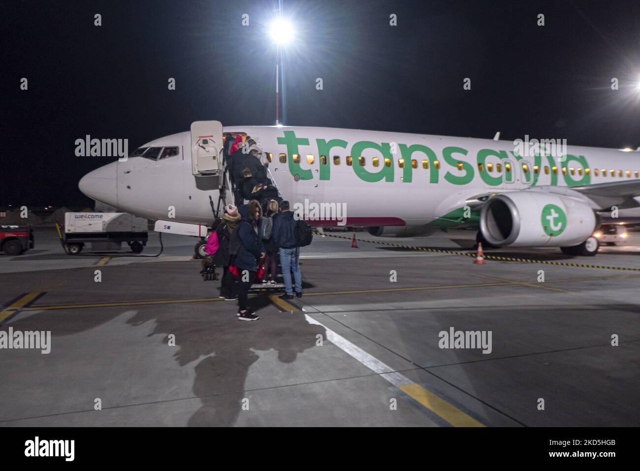 Passengers are seen boarding a Transavia low cost airline Boeing 737 ...