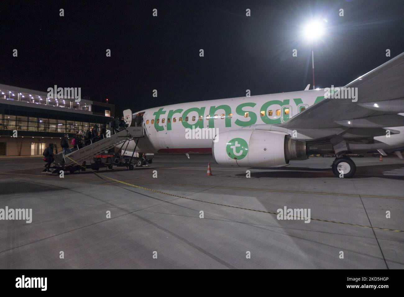 Passengers are seen boarding a Transavia low cost airline Boeing 737 ...
