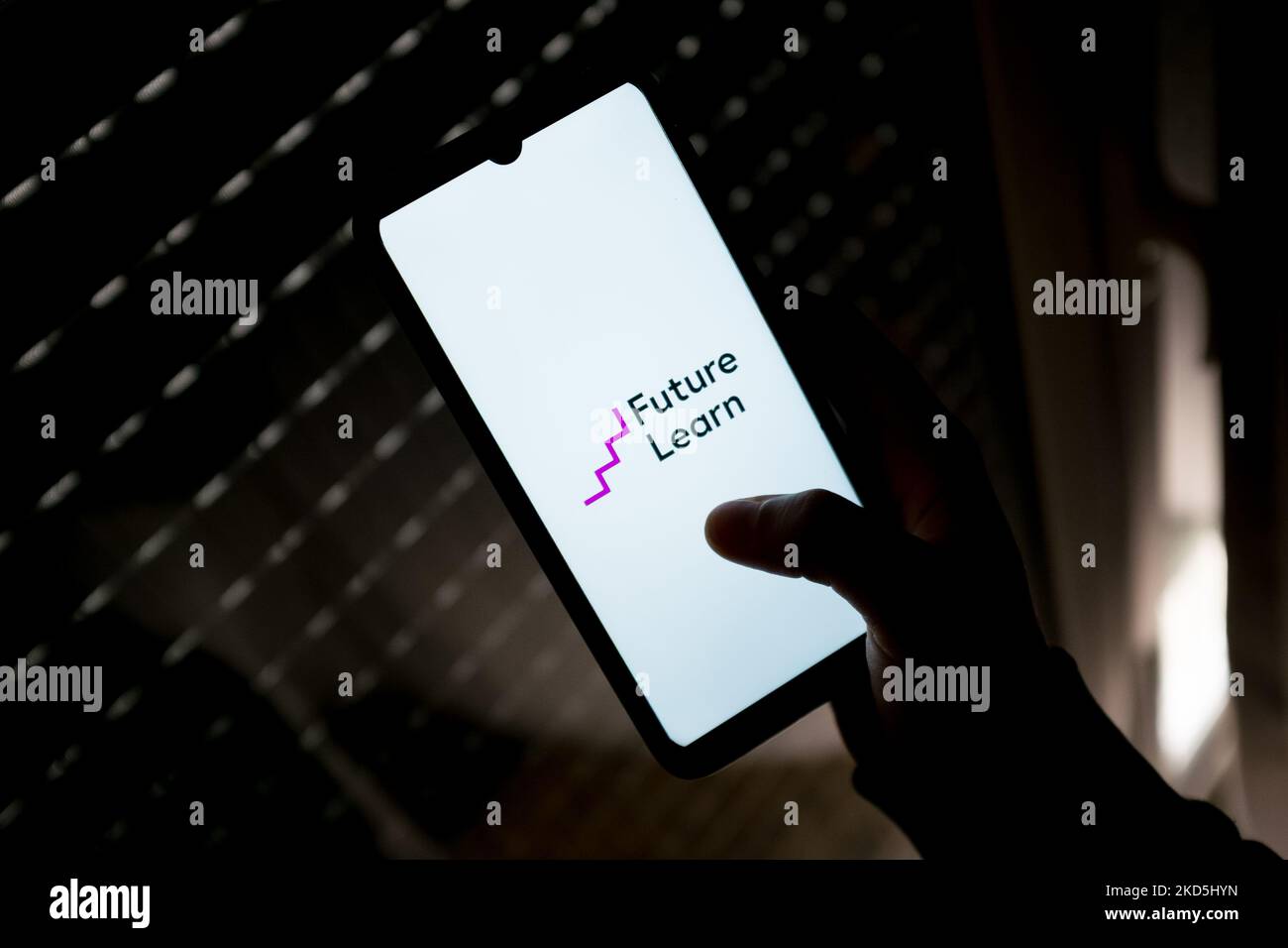 In this photo illustration a FutureLearn logo seen displayed on a ...