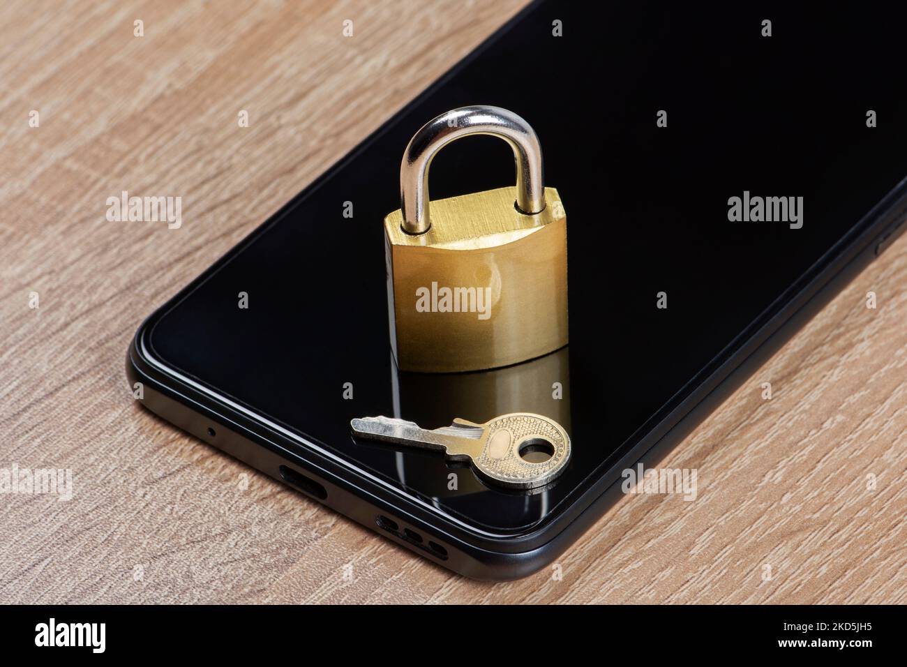 Smartphone with lock and key. Concept of cyber safety Stock Photo - Alamy