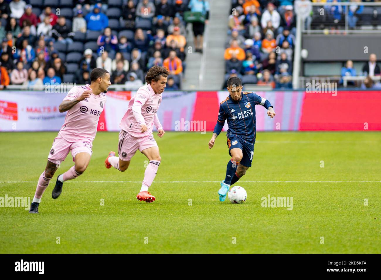 FC Cincinnati midfielder Luciano Acosta moves the ball upfield during a ...