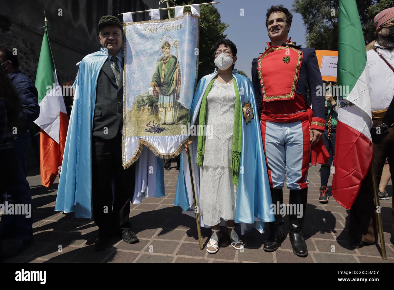 Wearing blue capes, members of the Most Illustrious Order of St ...