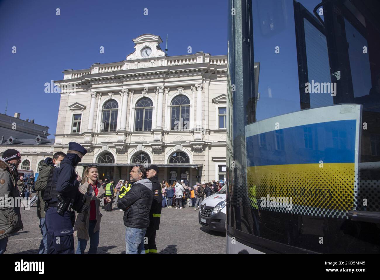Crowd of people, refugees who fled Ukraine are seen getting in the bus ...