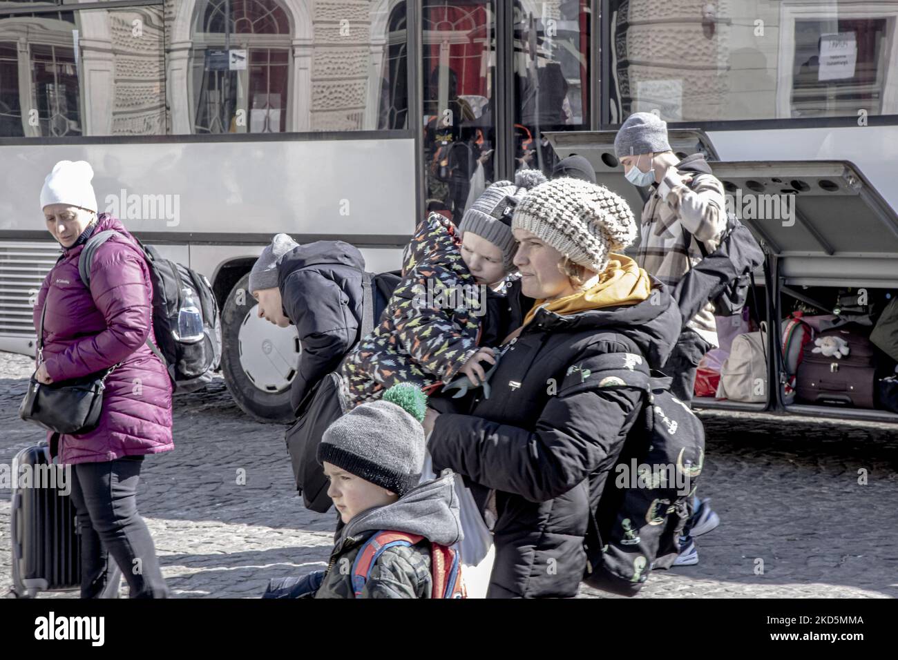 A mother with two children. Refugees from Ukraine arrive at the main ...