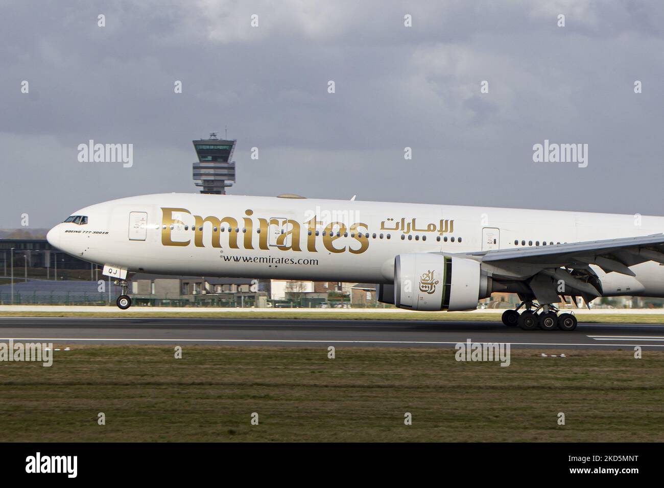 Emirates Boeing 777 aircraft as seen flying and landing on the runway ...