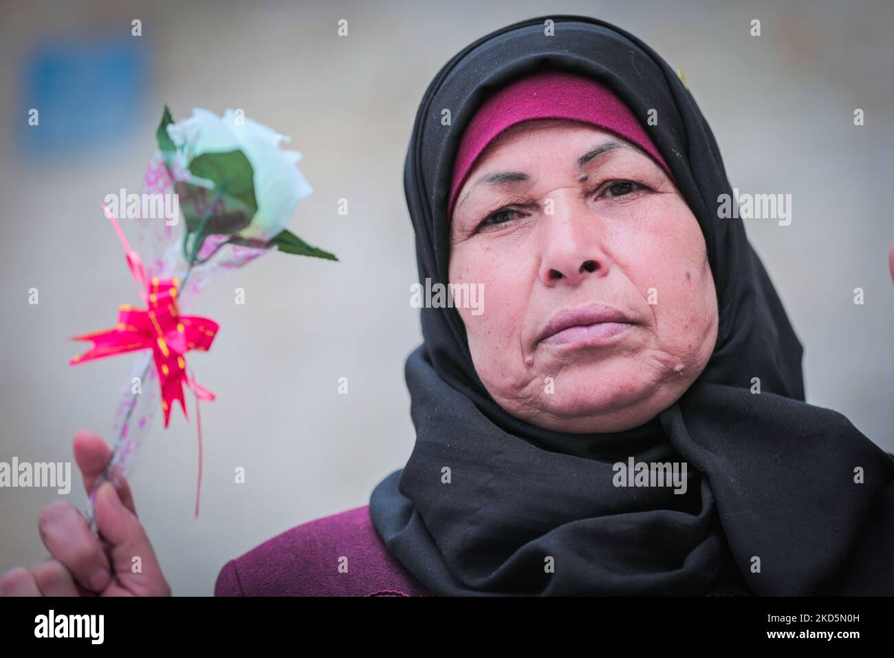 Mothers of Palestinian prisoners carry roses on International Mother's ...