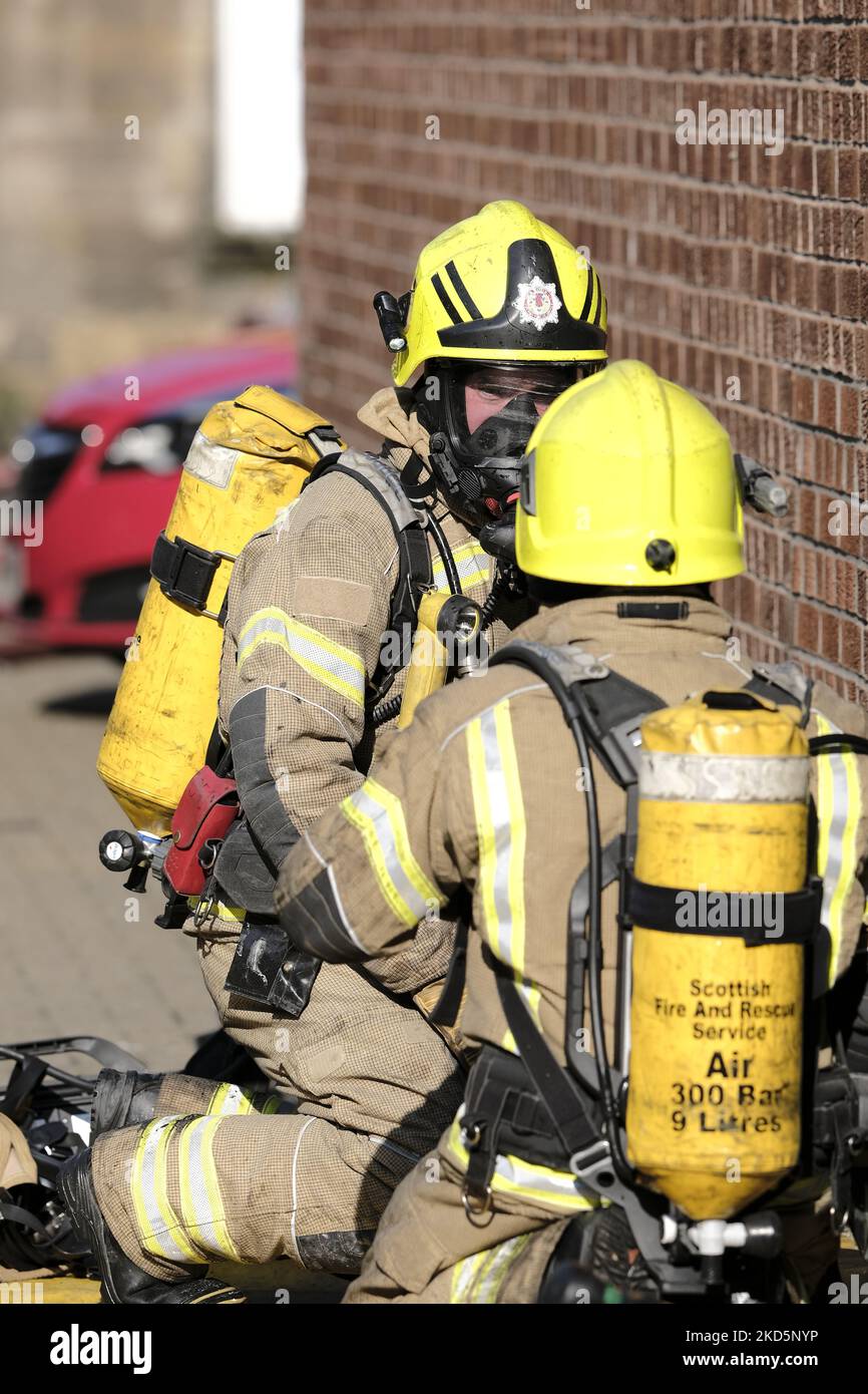 Firefighters wearing breathing apparatus return to BA control after ...