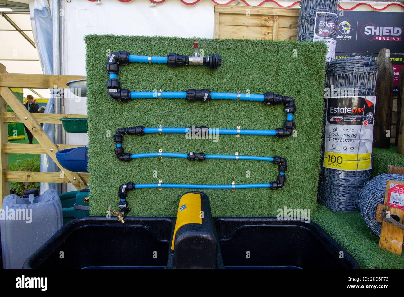 EXETER, DEVON, UK - JULY 1, 2022 trade stand - cattle water pipe ...