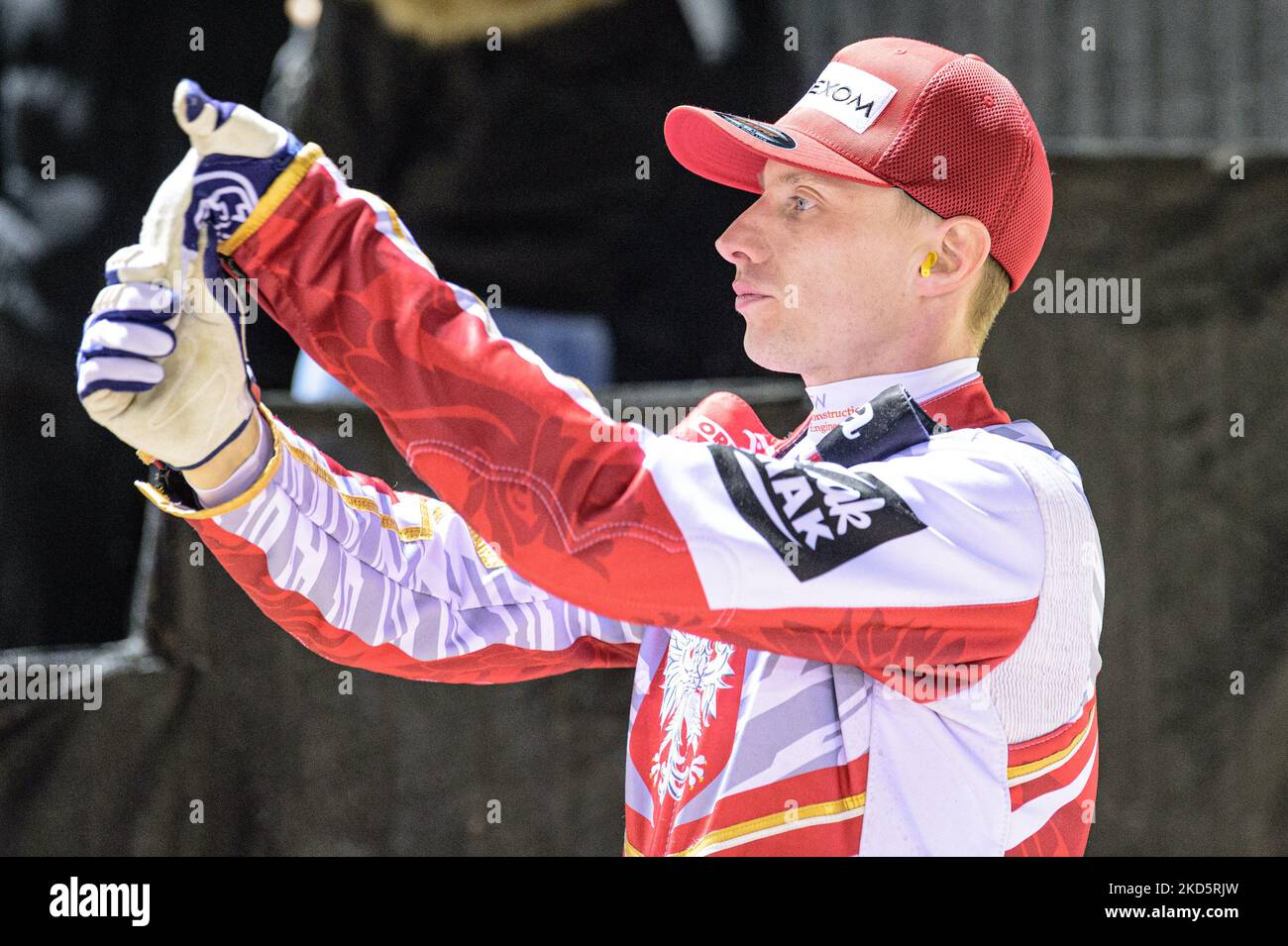 Tobiasz Musielak warms up with stretching exercises during the ATPI ...