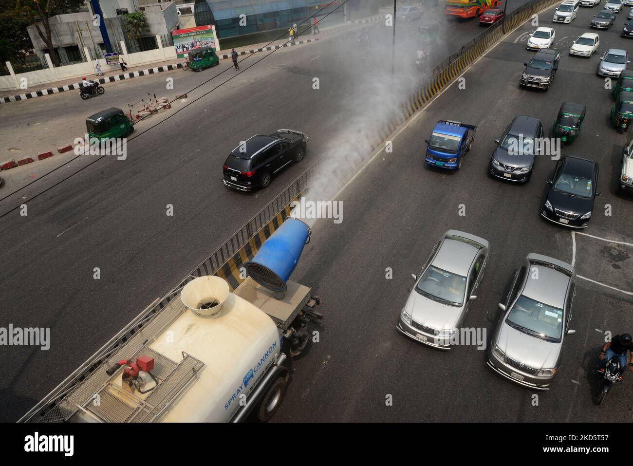 Mist spray cannon spraying water to control dust as the city’s air ...