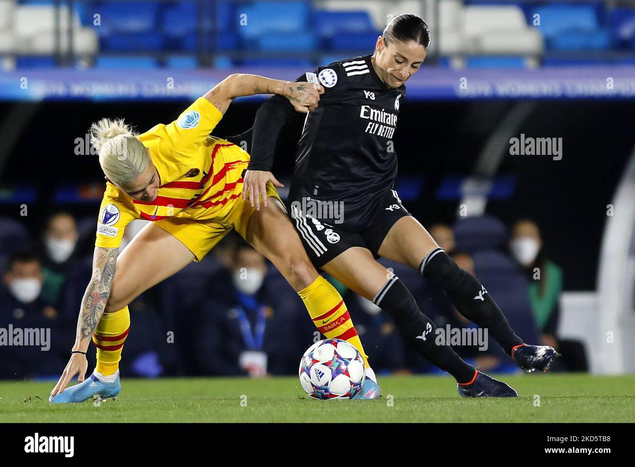Maria Leon of FC Barcelona in action with Ester of Real Madrid during ...