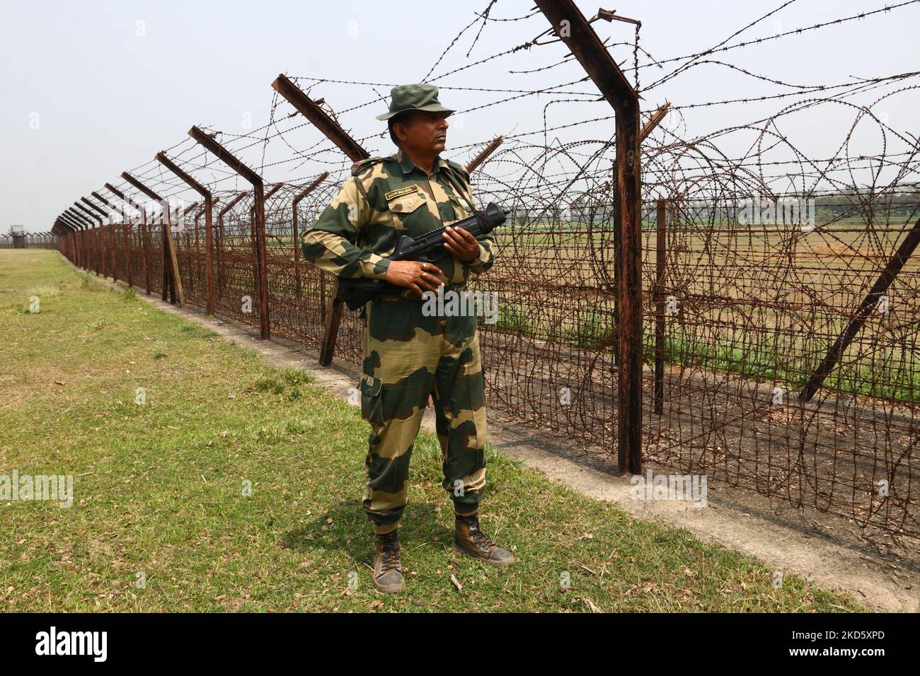 Indian Border Security Force (BSF) soldier patrolling at the near ...