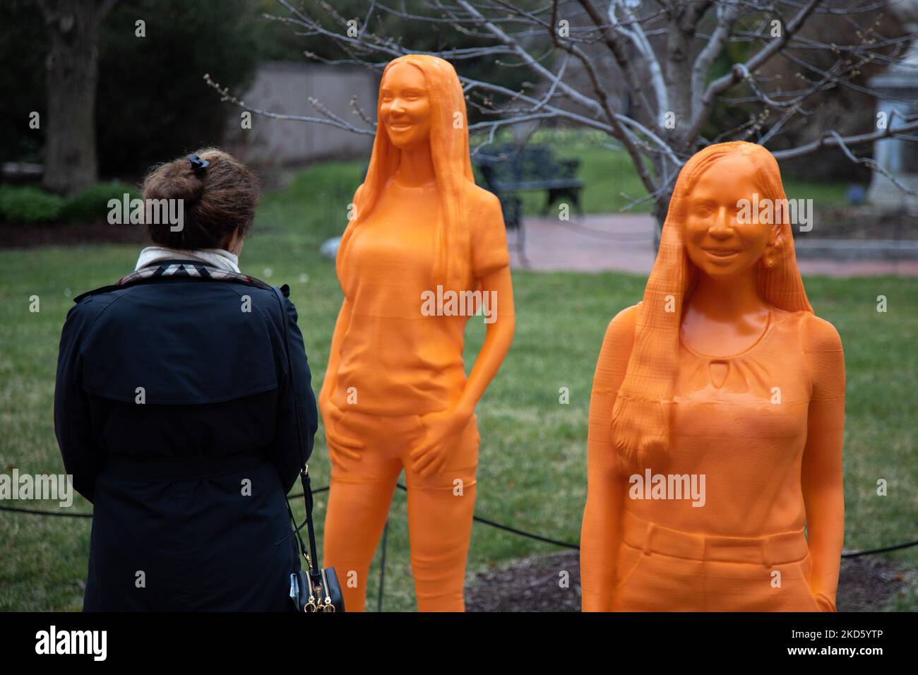 3-D printed orange statues celebrating contemporary women innovators in ...