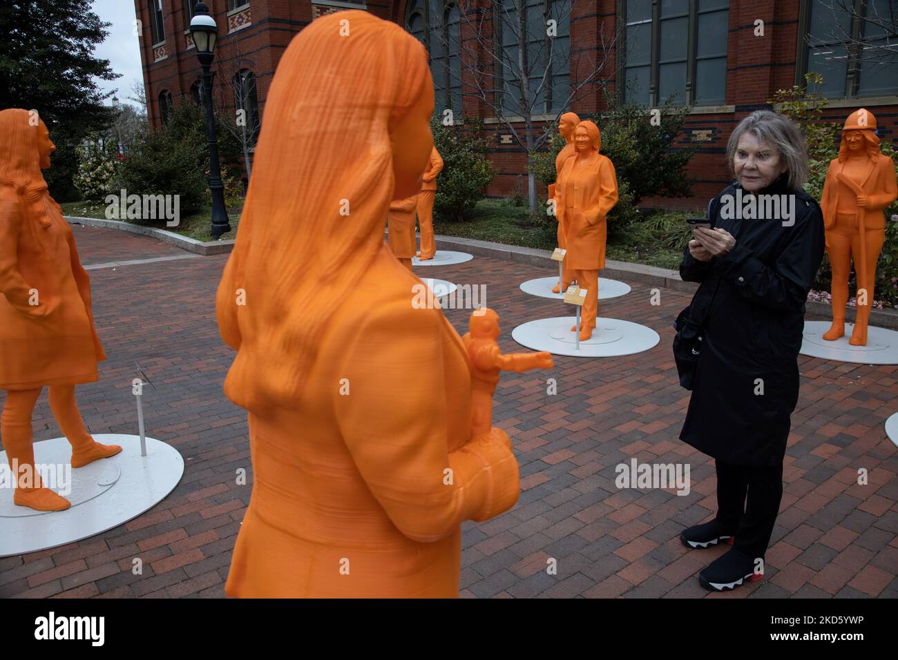 3-D printed orange statues celebrating contemporary women innovators in ...