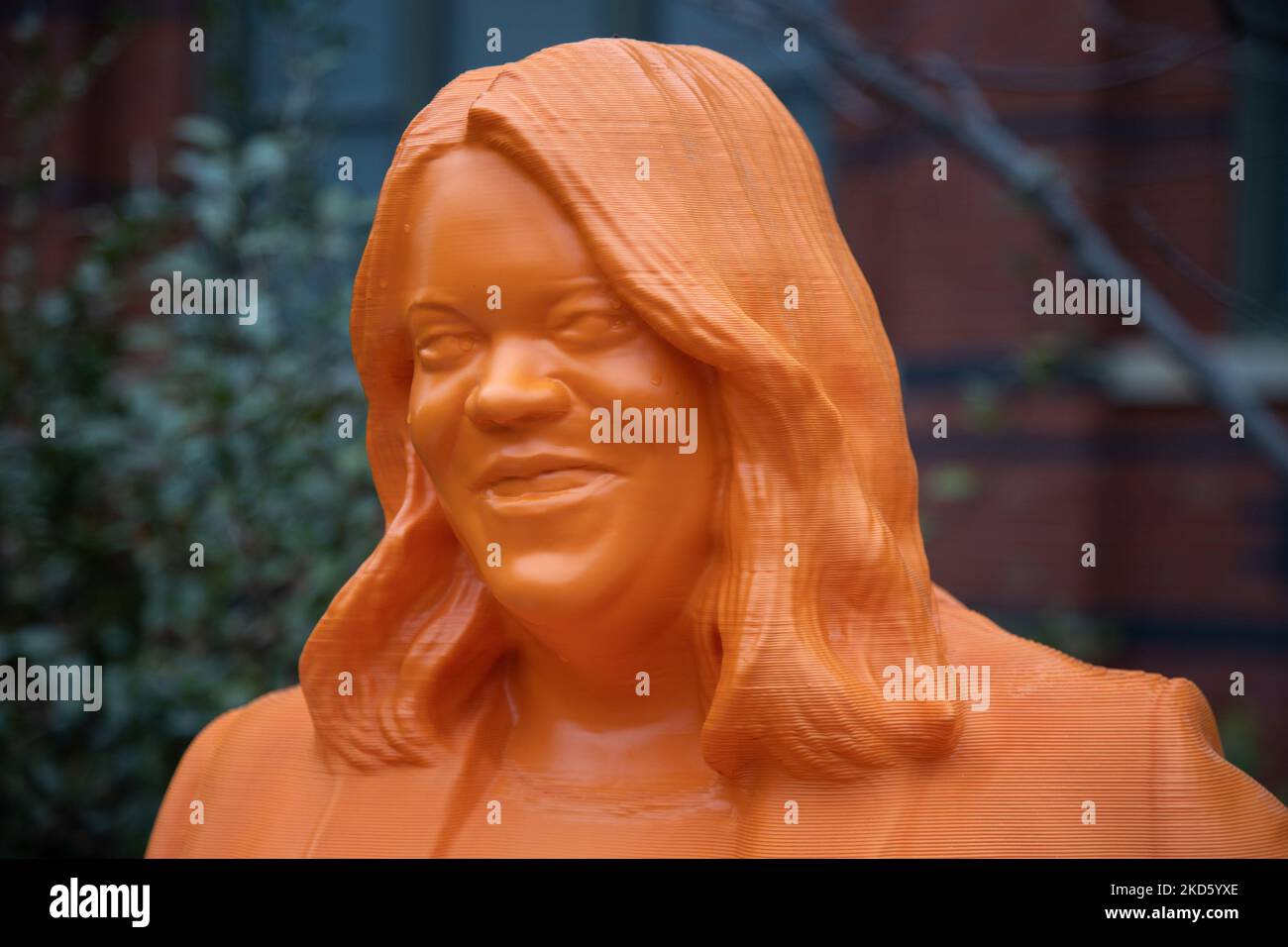 3-D printed orange statues celebrating contemporary women innovators in ...