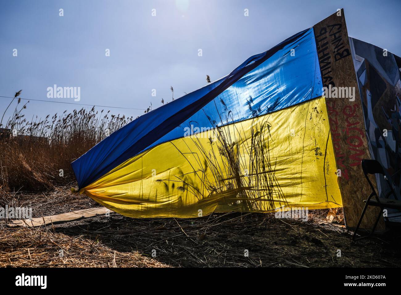 An Ukrainian flag is seen at Ukrainian-Polish border crossing while the ...