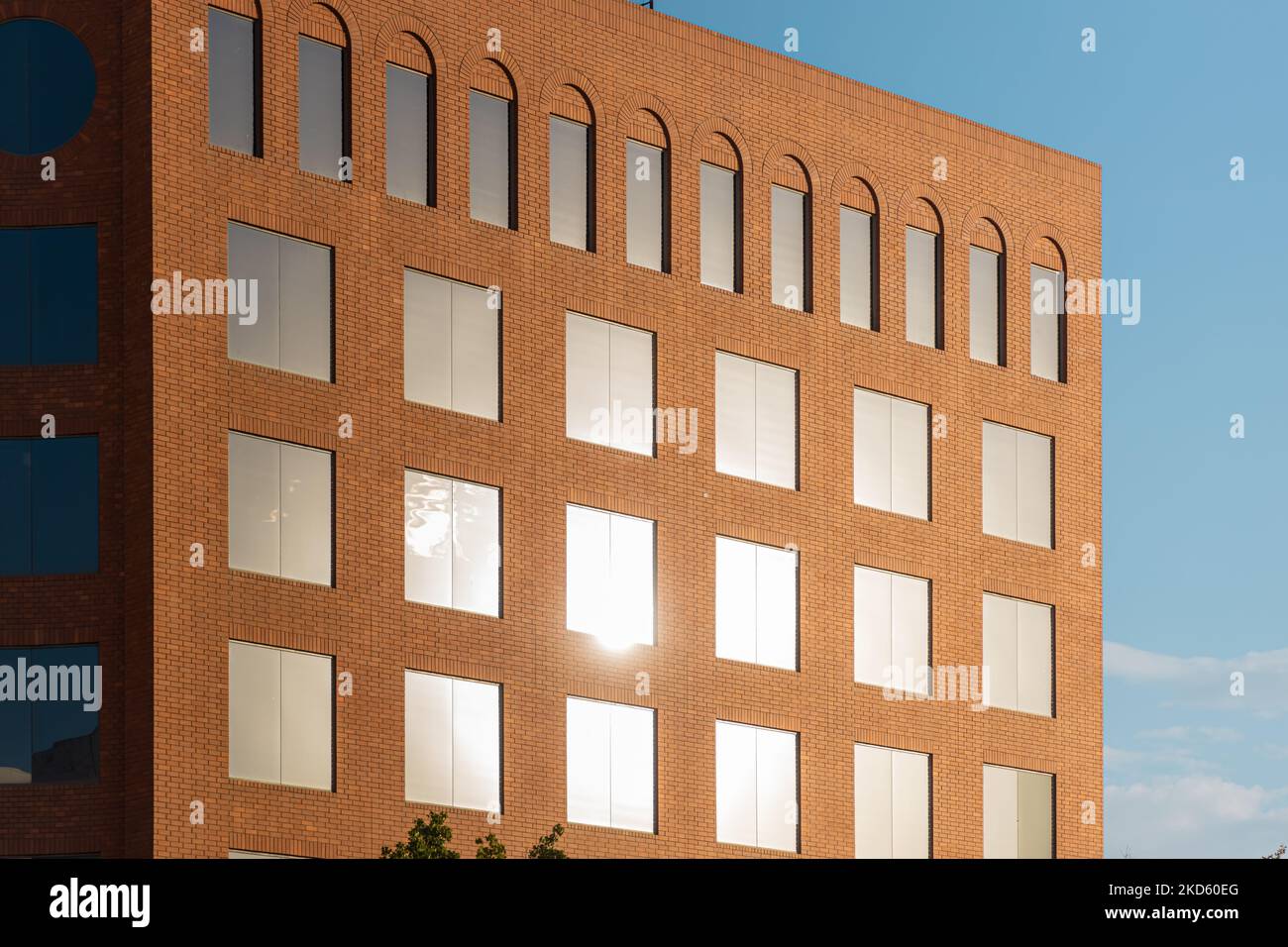 A minimalistic shot of a modern office building exterior with windows ...