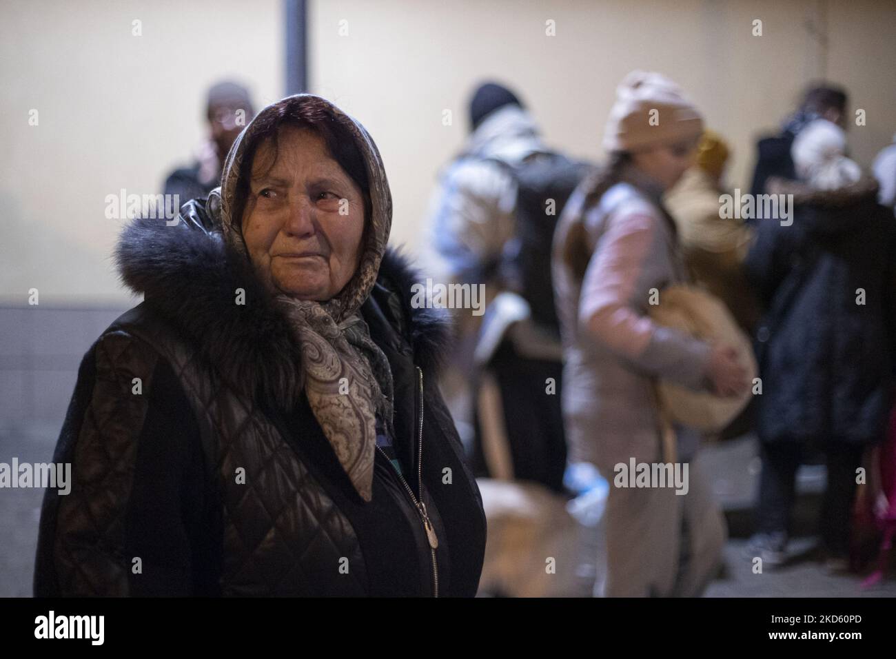 Old women cry and hug as they arrive safely in Poland. Refugees from ...