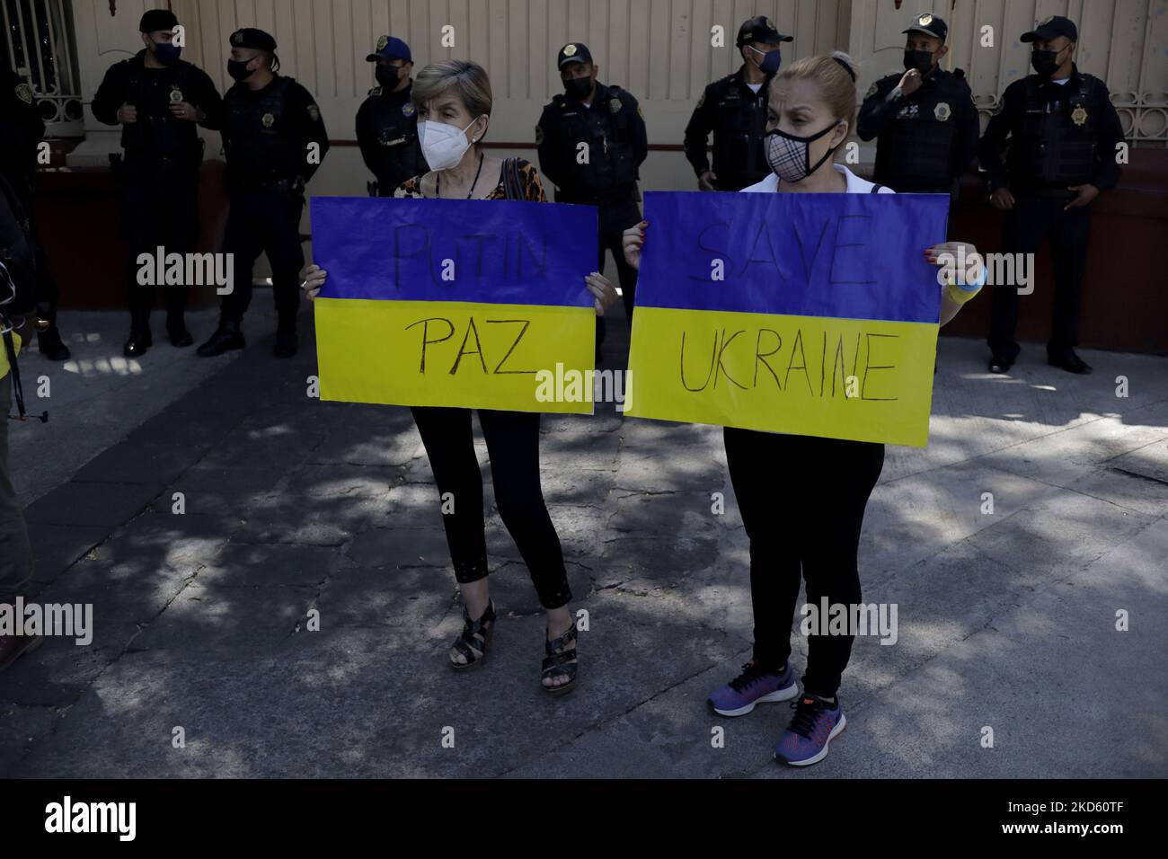 Amnesty international activists in mexico demonstrate in support hi-res ...