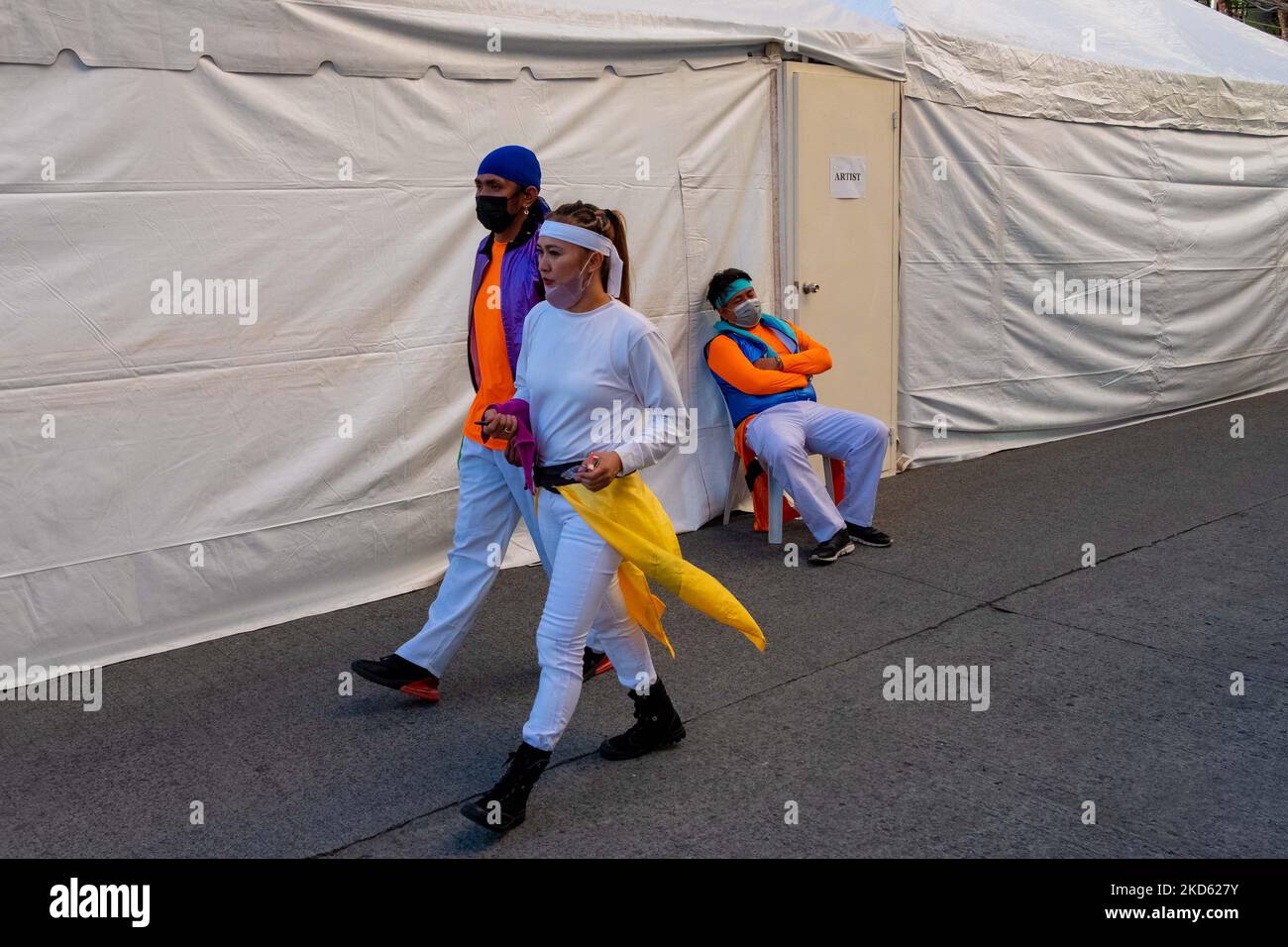 Artists performing for a political campaign rally wait backstage at the ...
