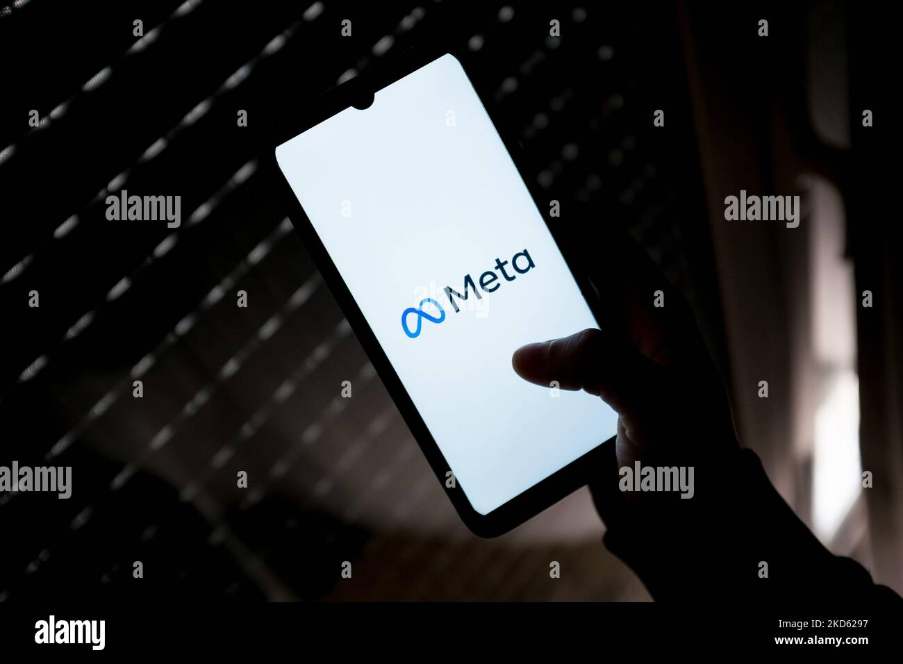 In this photo illustration a Meta logo seen displayed on a smartphone ...