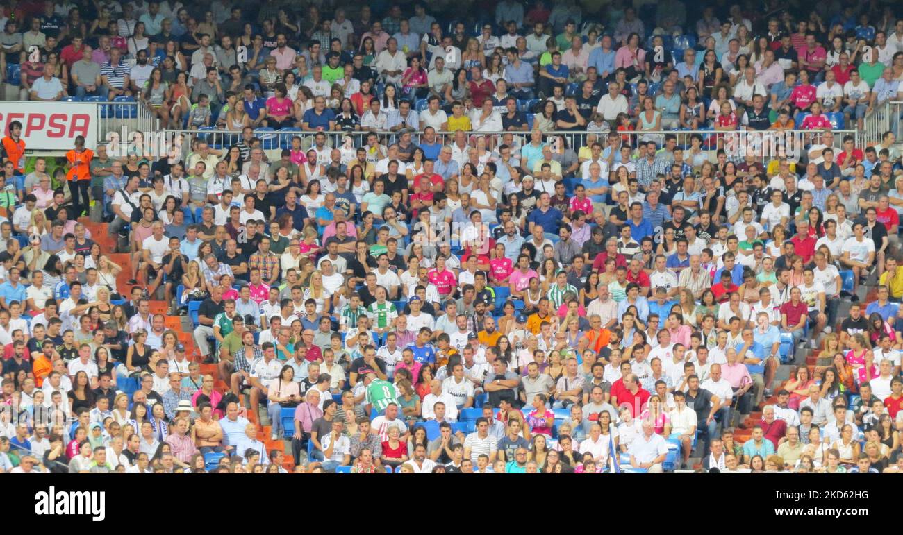 A stadium full of people sitting and watching a football match Stock ...