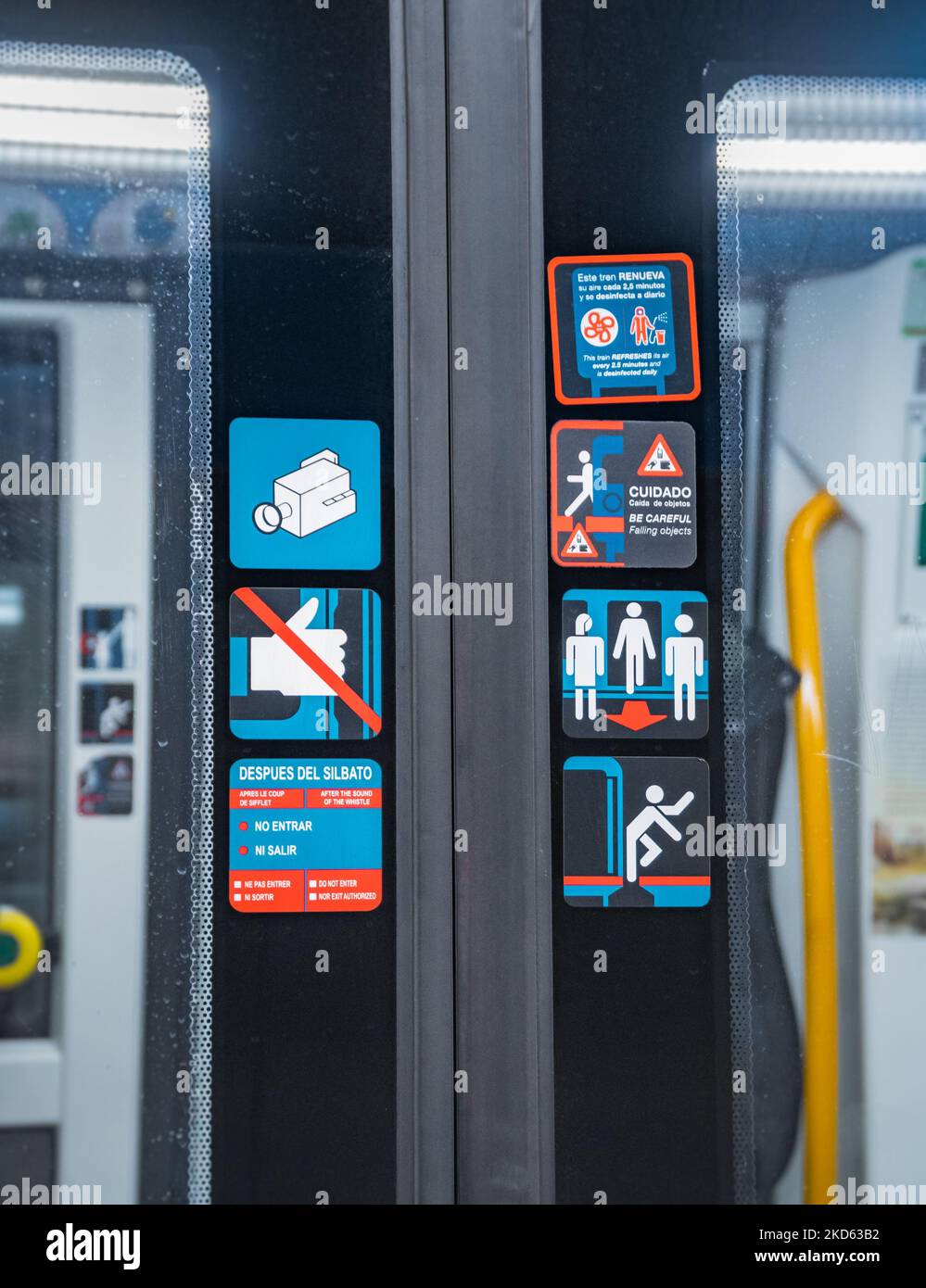 A vertical shot of the warning symbols and indications on the doors of ...