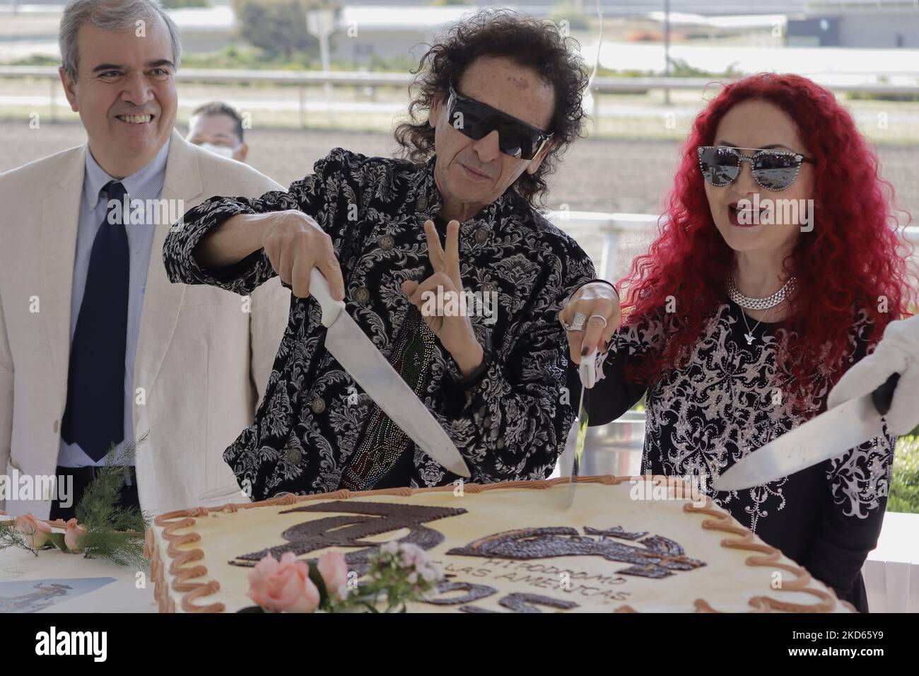 With knives, Alex and Celia Lora, Mexican singers, during the ...