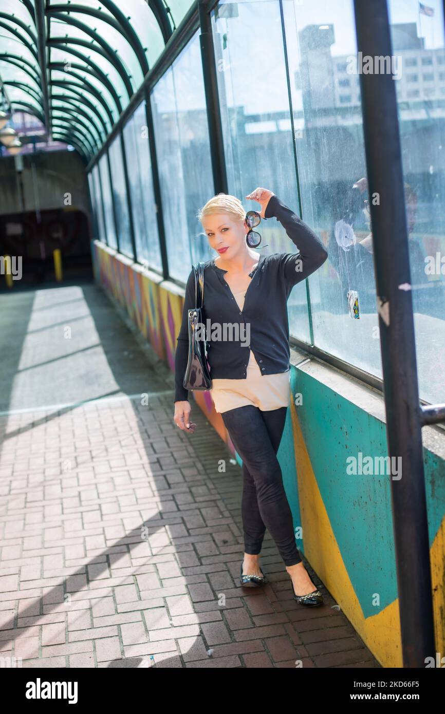 Pretty woman in city scene Stock Photo - Alamy