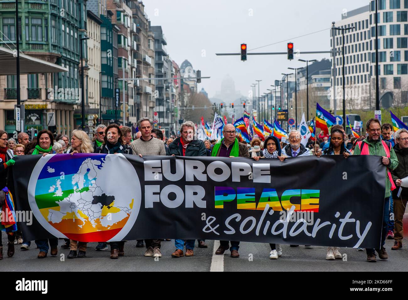 People are holding the principal banner, during the National peace ...