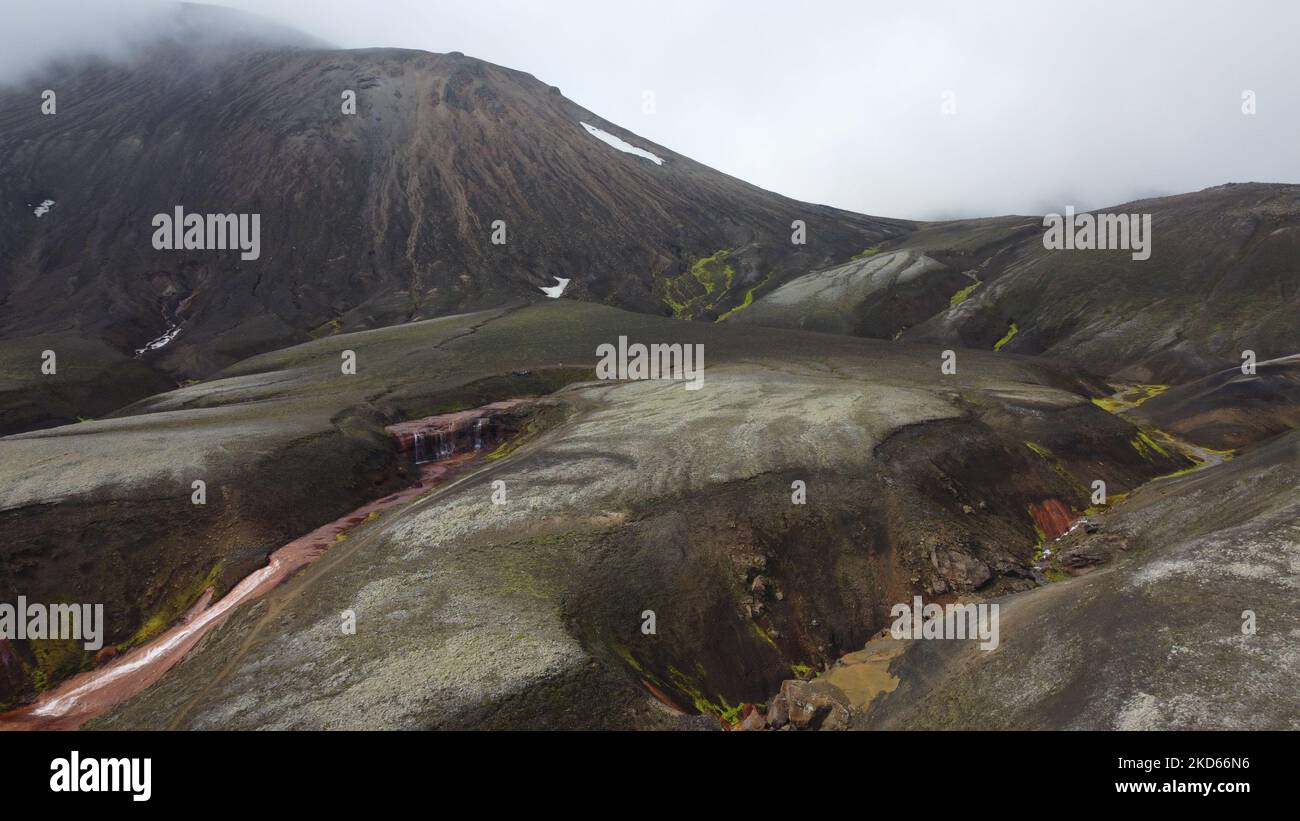 An aerial view of a river flowing through mountains Stock Photo - Alamy