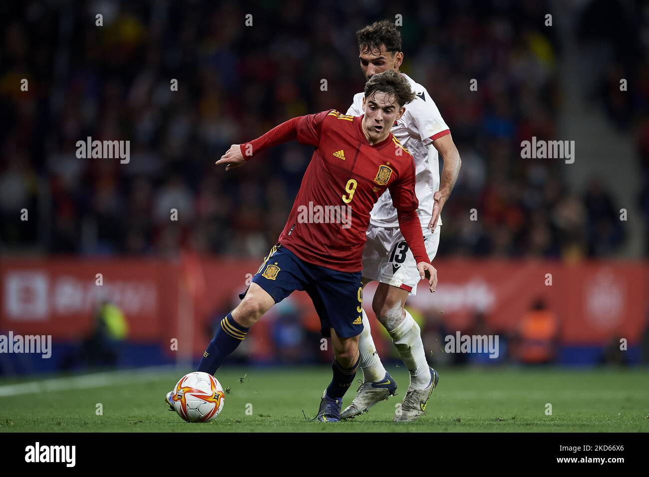 Gavi (FC Barcelona) of Spain and Qazim Laci (AC Ajaccio) of Albania ...
