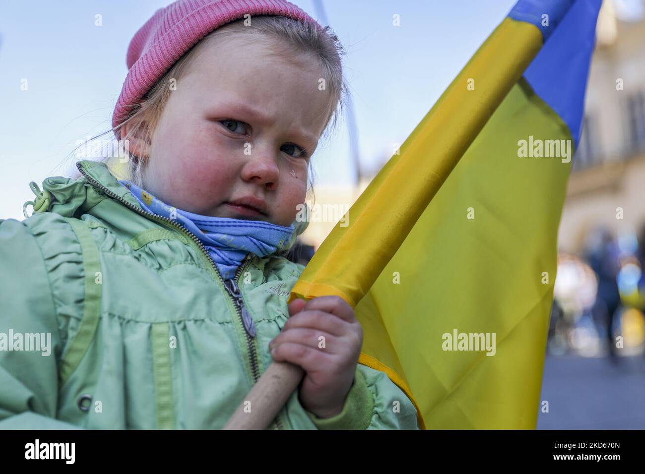 A Small Girl Is Seen Crying While Attending A Demonstration Of