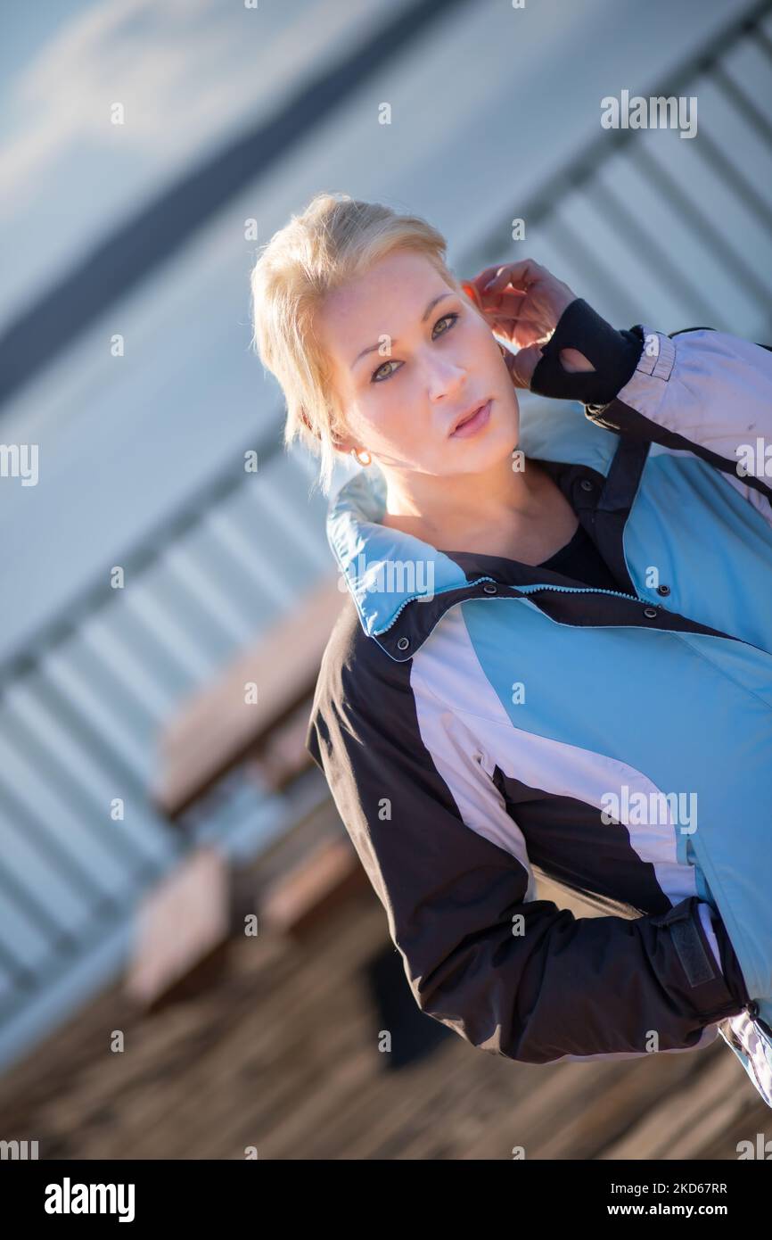 Pretty woman on a dock Stock Photo - Alamy
