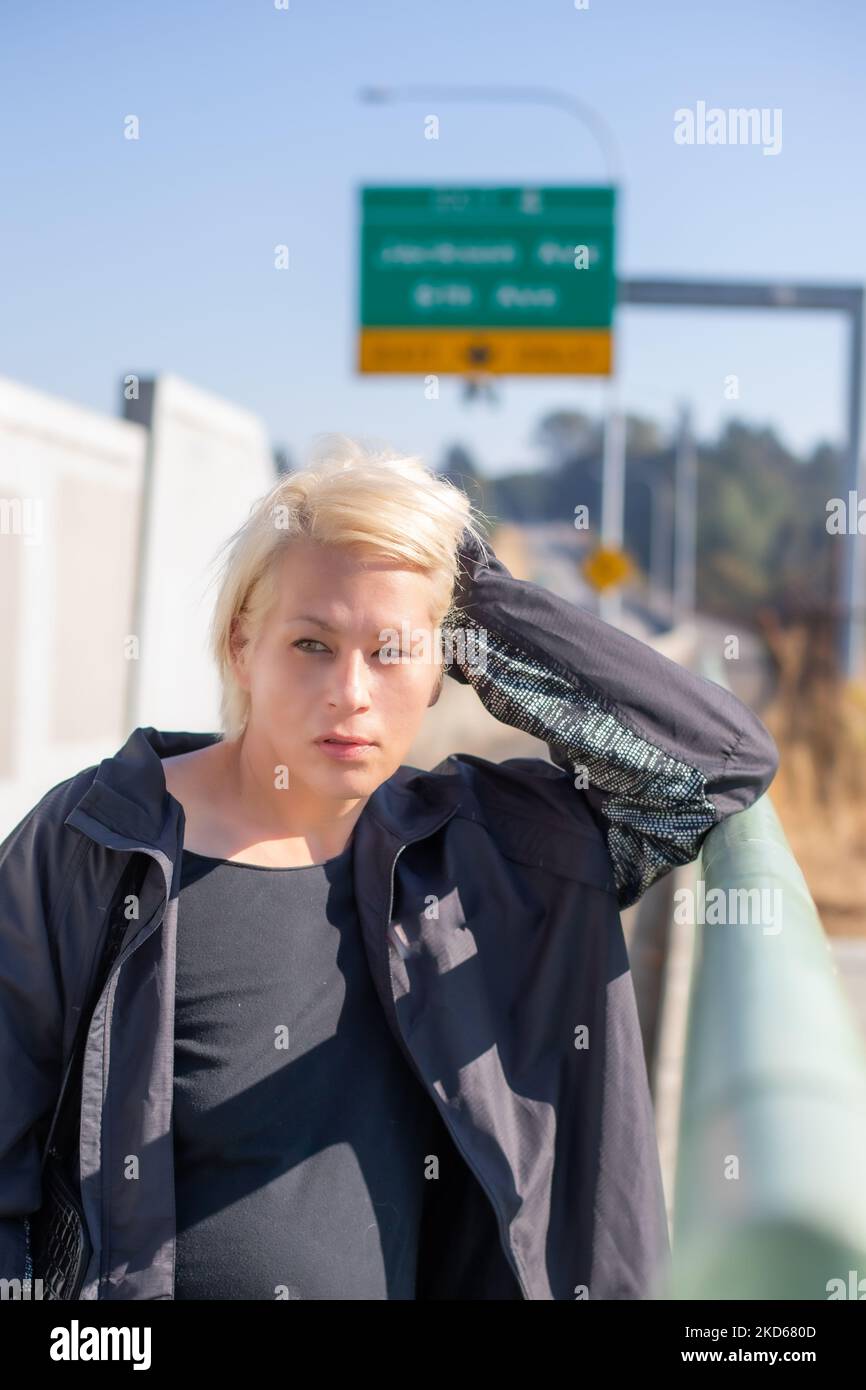 Pretty woman on a city street Stock Photo - Alamy