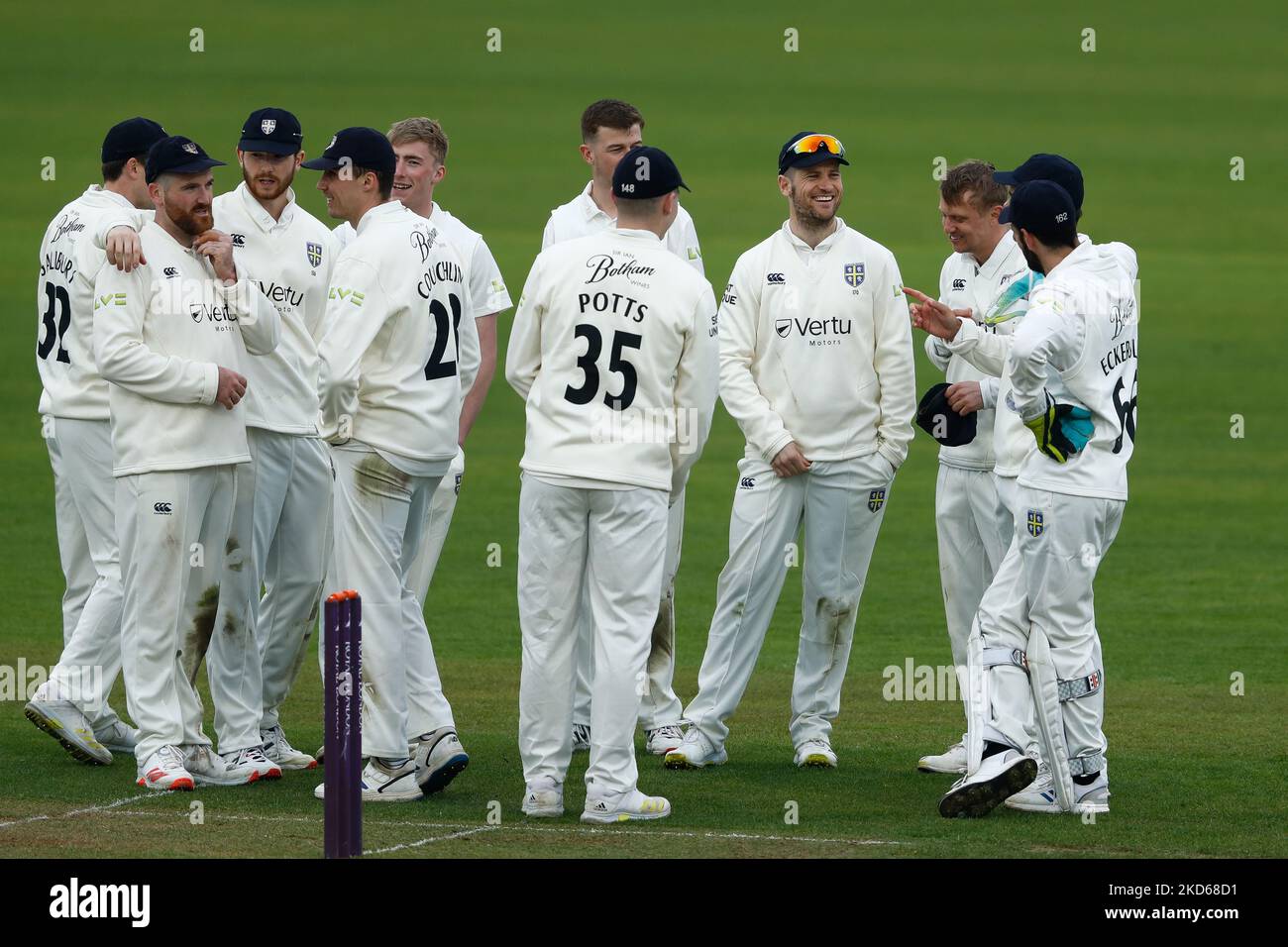 Durham players congregate after taking a wicket during the Friendly ...