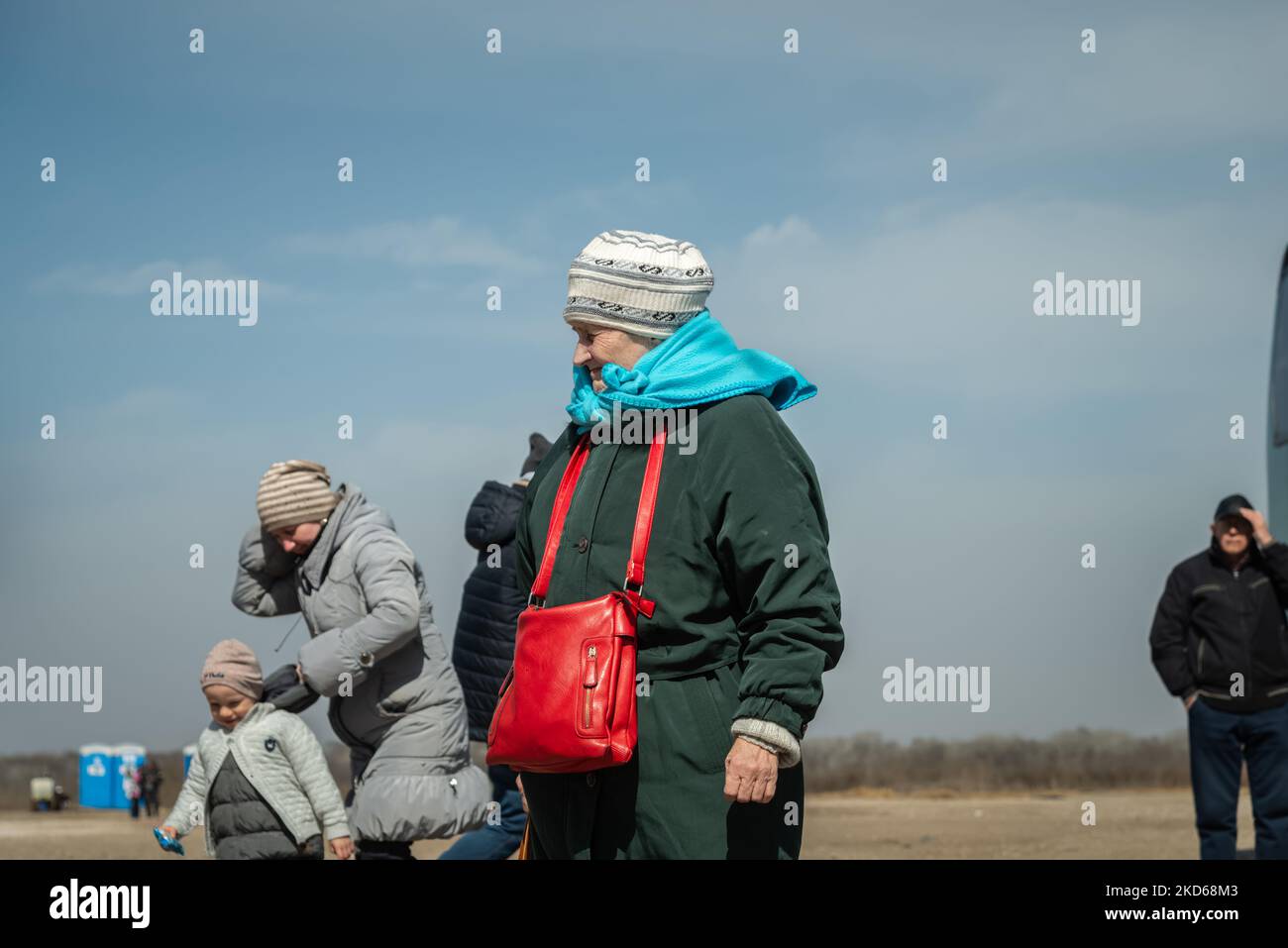 Ukrainian citizens are seen at the transit point for refugees in ...