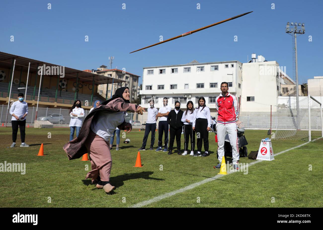Palestinians participate in a sports activity during the initiative to ...