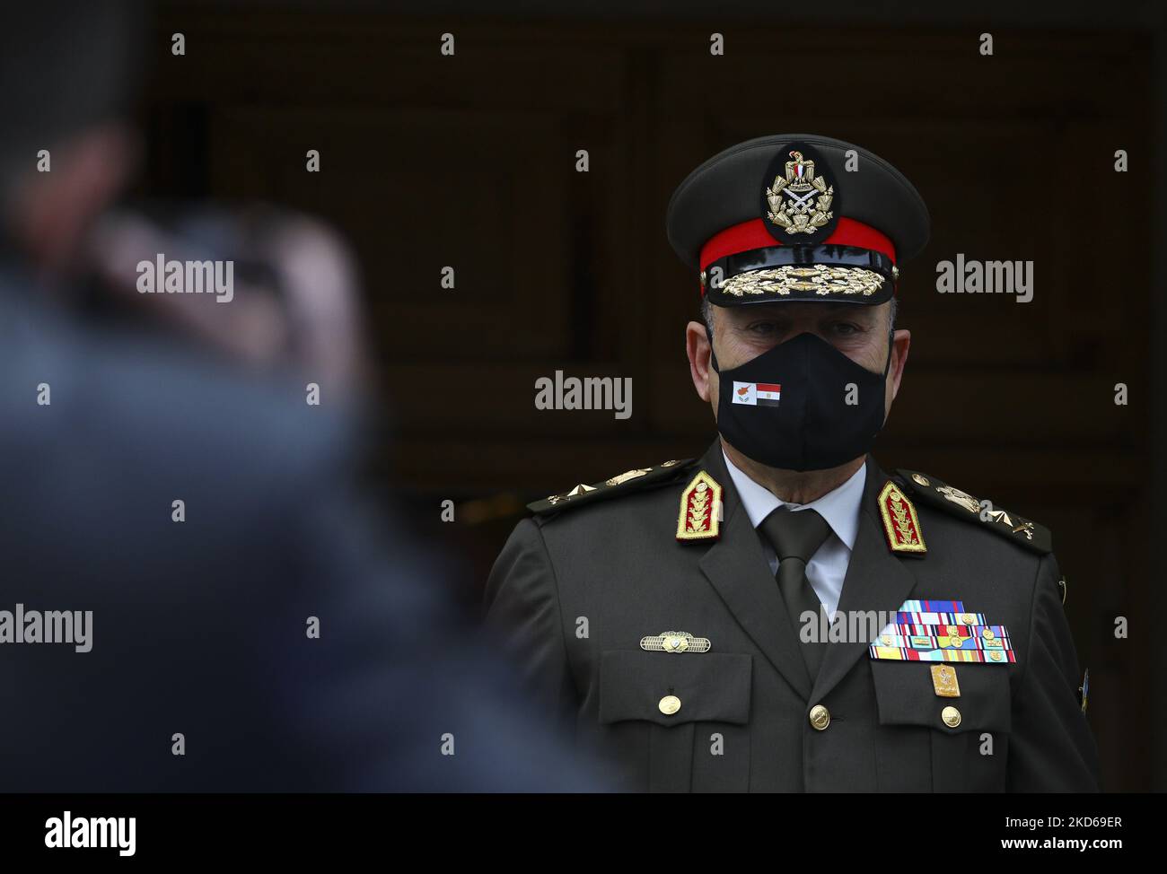 A photojournalist takes a picture of the Chief of Staff of the Egyptian ...