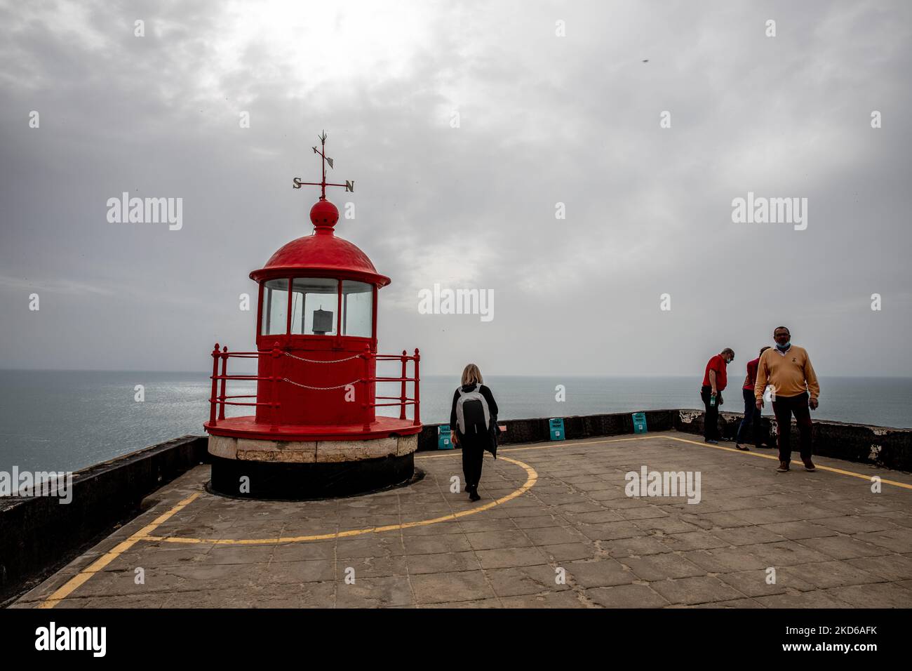 A view of the red lighthouse in Nazare, Portugal, on March 28, 2022 ...