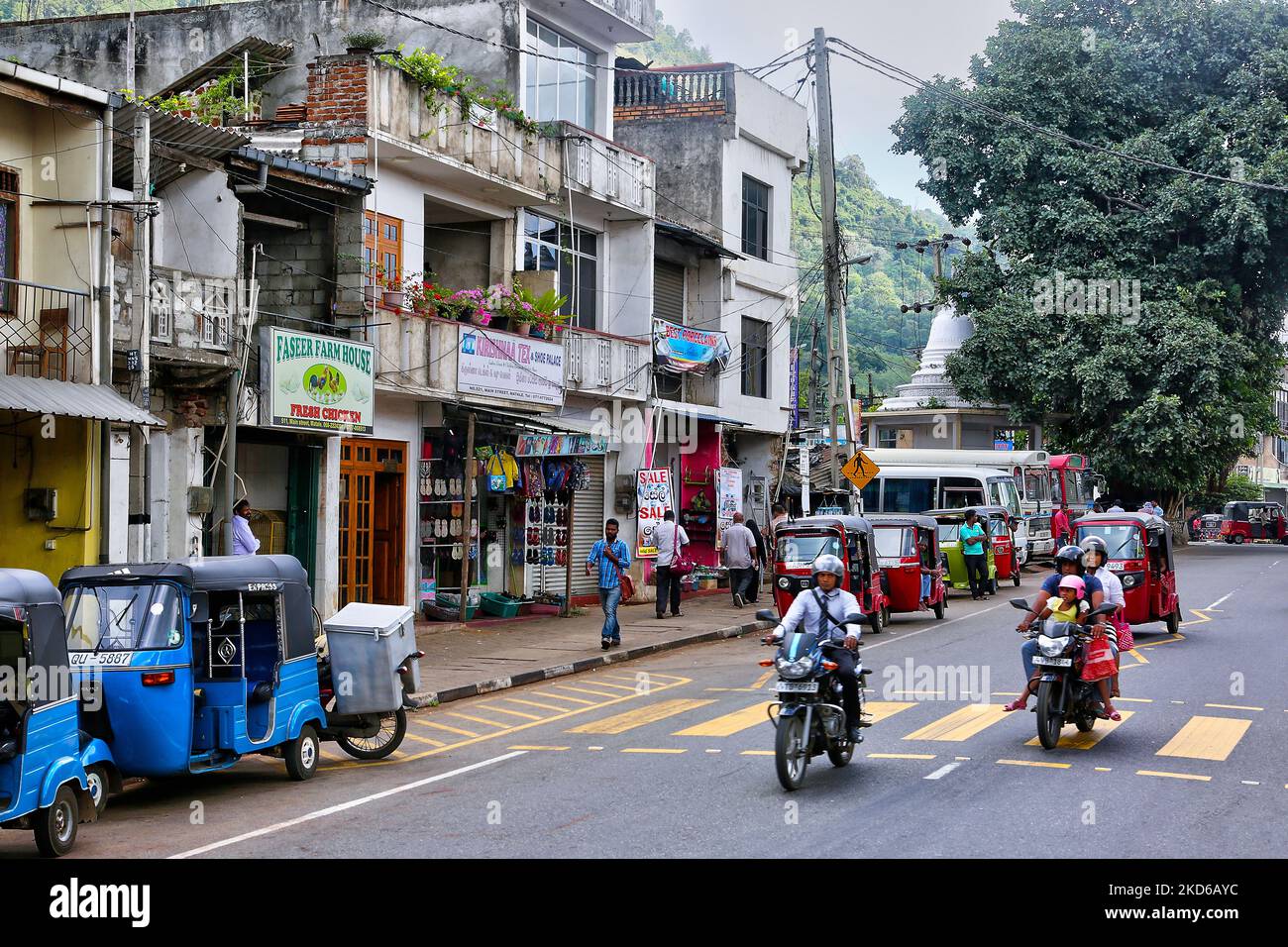 Vehicles travel along a road in Matale, Sri Lanka. (Photo by Creative ...