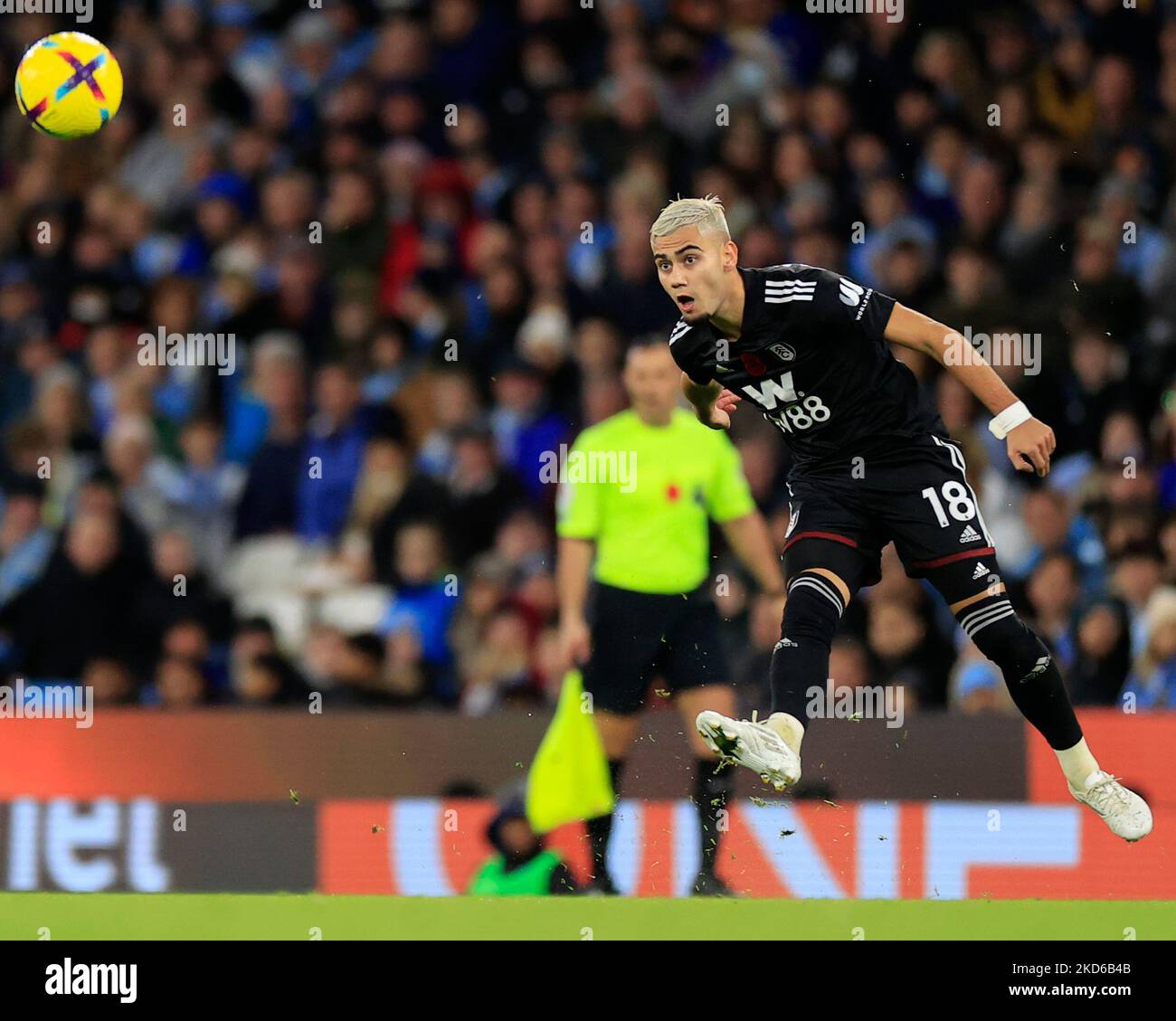 Andreas Pereira #18 of Fulham passes the ball during the Premier League ... Andreas Pereira #18 of Fulham passes the ball during the Premier League ...