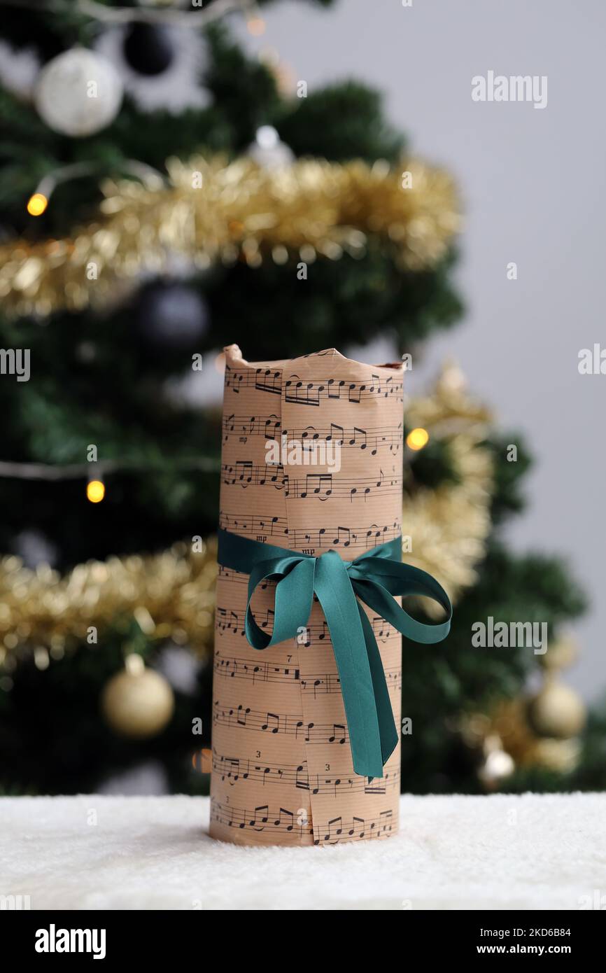 Espoo, Finland, December 2019: Christmas gift wrapped into a brown ...