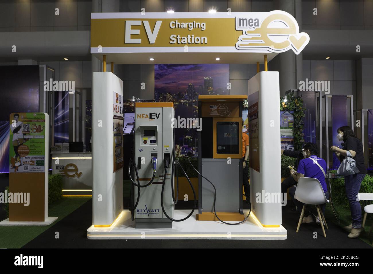 At the booth that shows the electric power charger for electric cars ...