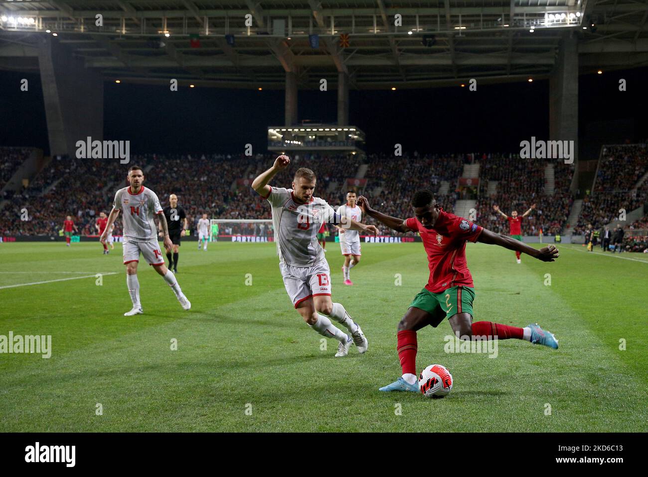 Portugal's defender Nuno Mendes (R ) vies with North Macedonia's ...